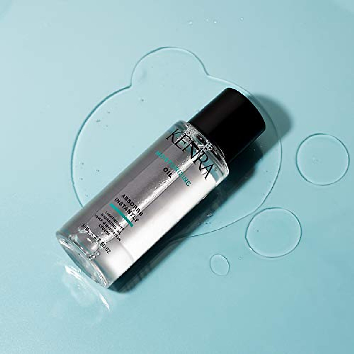 Kenra Moisturizing Oil | Lightweight Hydrating Oil | Absorbs Instantly | Multipurpose Oil For Treating, Styling, & Finishing | Provides Thermal Protection | All Hair Types | 2.7 fl. Oz