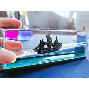 Journey Bug Unsinkable Pirate Ship Fluid Toy Paper Weight