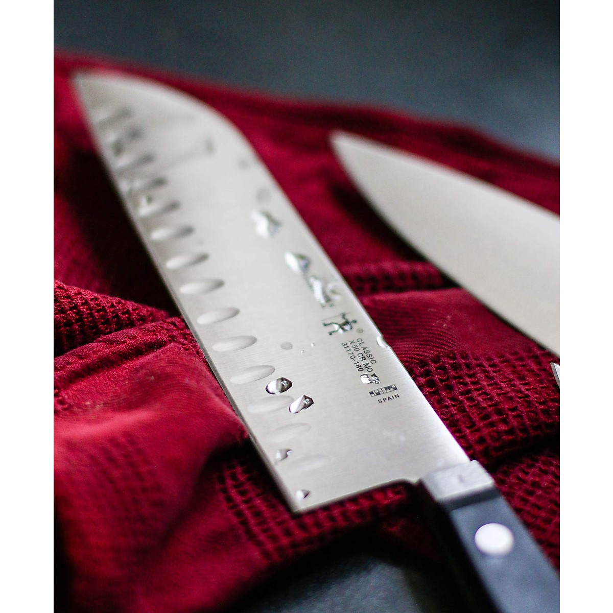 HENCKELS Classic Razor-Sharp 7-inch Hollow Edge Santoku Knife, German Engineered Informed by 100+ Years of Mastery