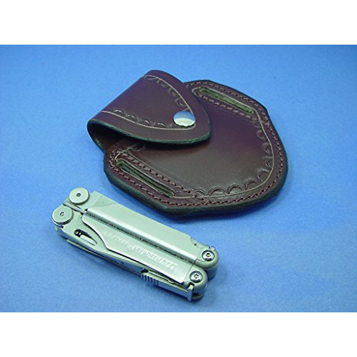 Custom Made Leather Sheath for The Wave Multi-Tool. Made Out of 10oz Leather Dyed Dark Brown. Right or Left Hand Side Sheath Only The Multitool is Not Included. Fits up to 1 3/4" Belt.