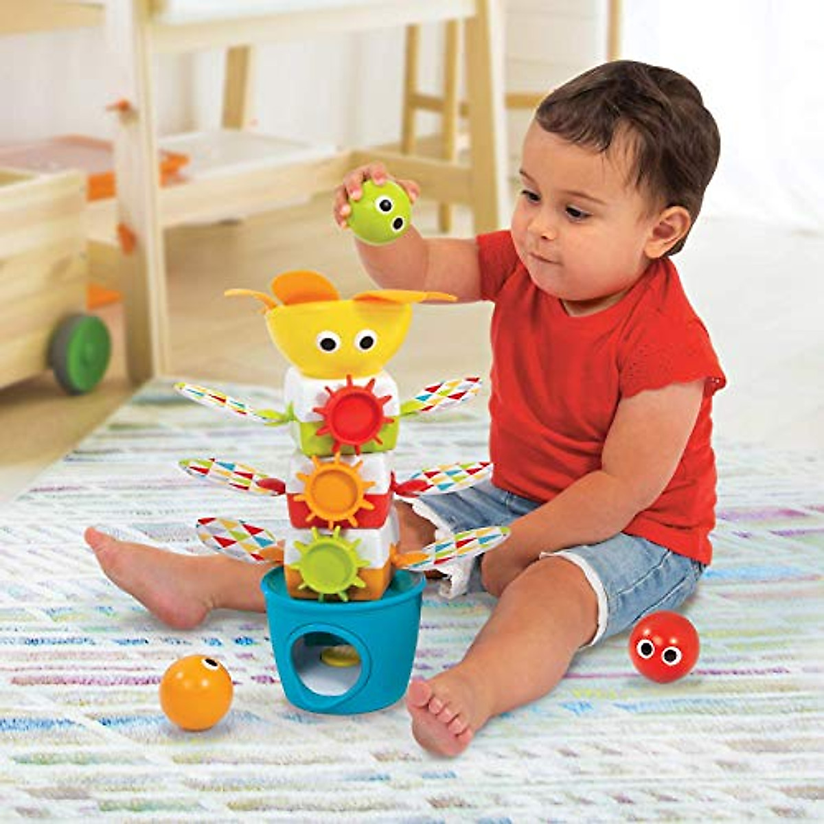 Yookidoo Babies Musical Tumble Ball Stacker Toy. Colorful Sensory Toddlers STEM Enhancing Game. Battery Operated Stacking Tumbling Play. Ages 9 Month Up.