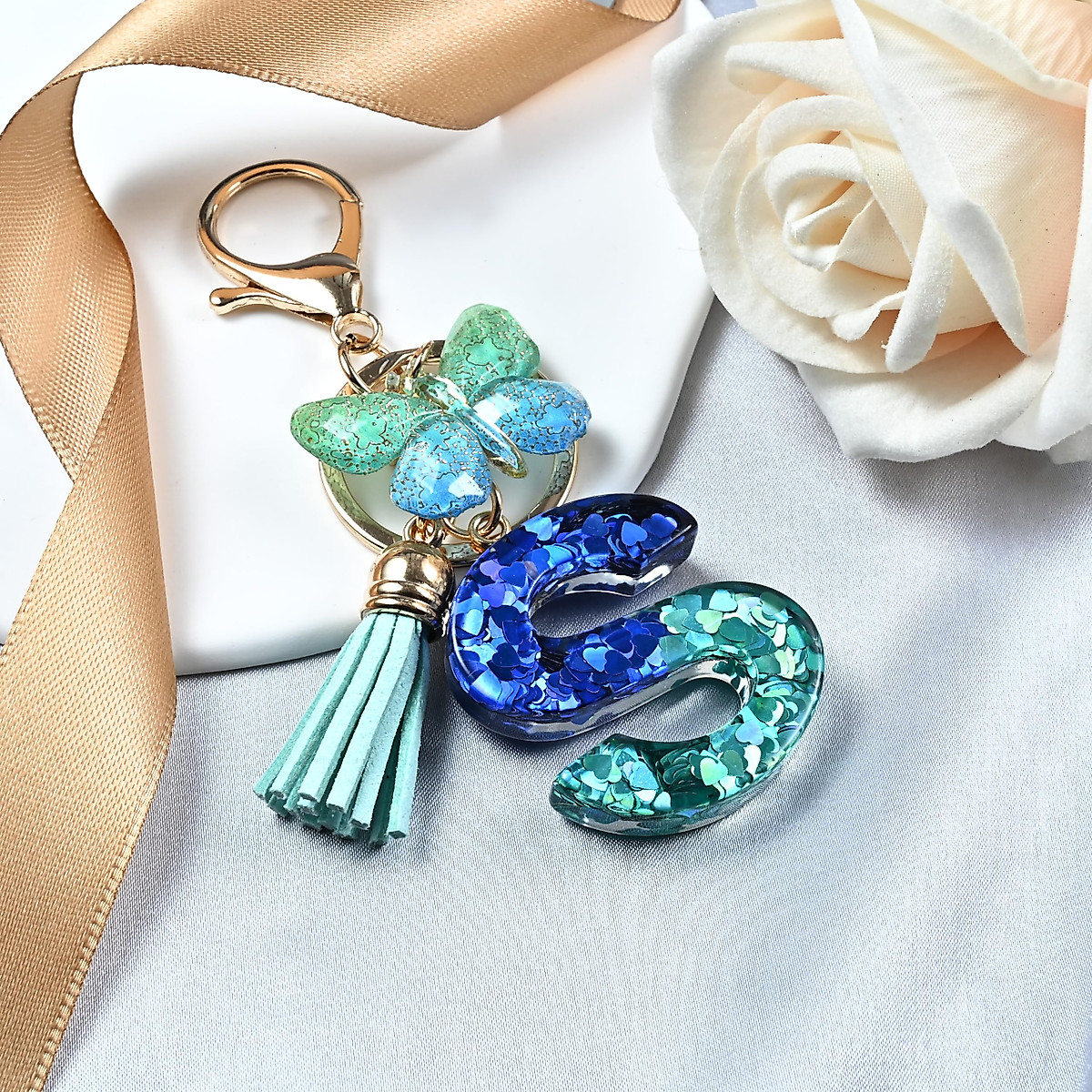 JINGUAZI Initial letter Keychains for Women Tassel Butterfly Pink Purple Cute Car Keychain for Wallet Backpack bag charm (S-Blue Green)