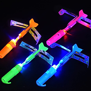 JX Rocket Slingshot Flying Toys with Led Lights,12Pcs LED Arrow Helicopters + 12Pcs Launchers,Summer Outdoor Game LED Slingshot Toy for Kids, Glow in The Dark Kids Party Supplies