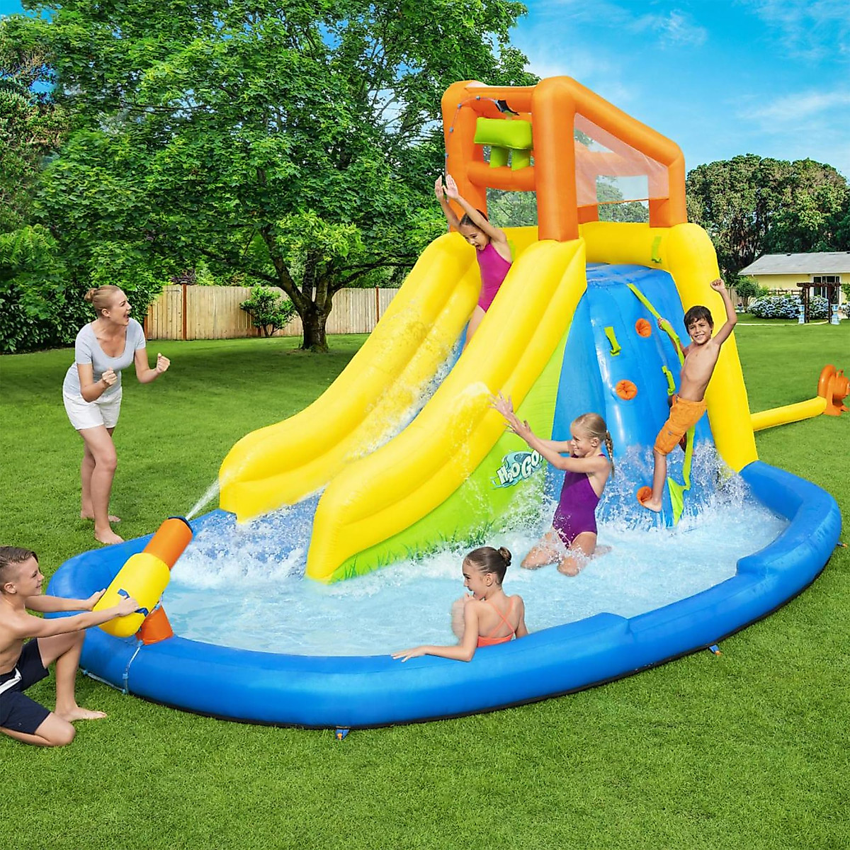 Bestway H2OGO! Mount Splashmore Kids Inflatable Outdoor Backyard Water Slide Splash Mega Park Toy w/Climbing Wall, Slide, Splash Zone, & Spray Blaster.