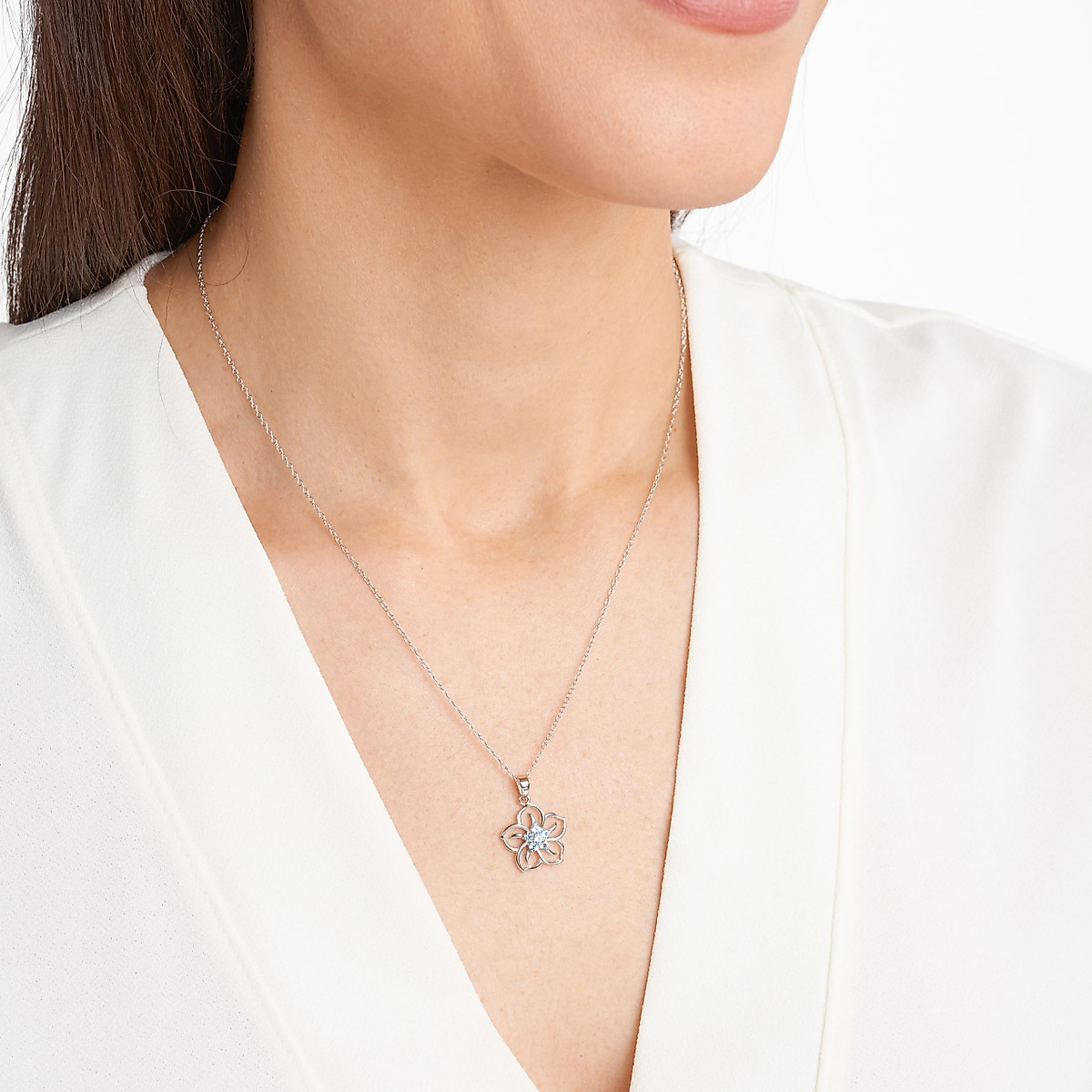 Amazon Essentials Sterling Silver Genuine Sky Blue Topaz Flower Pendant Necklace, 18" (previously Amazon Collection)