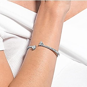 SWAROVSKI Mesmera Bangle Bracelet, Heart-Shaped Clear Crystals on a Rhodium Finish Cuff, Size M, from the Attract Soul Collection