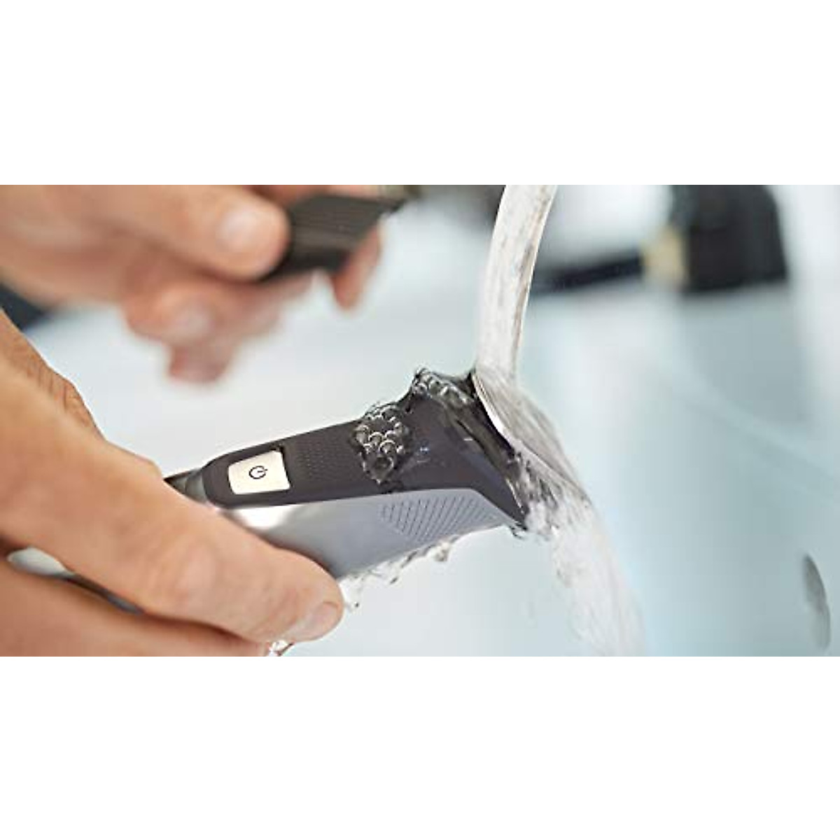 Philips Norelco Multigroomer All-in-One Trimmer Series 7000, 23 Piece Mens Grooming Kit, Trimmer for Beard, Head, Body, and Face, NO Blade Oil Needed, MG7750/49