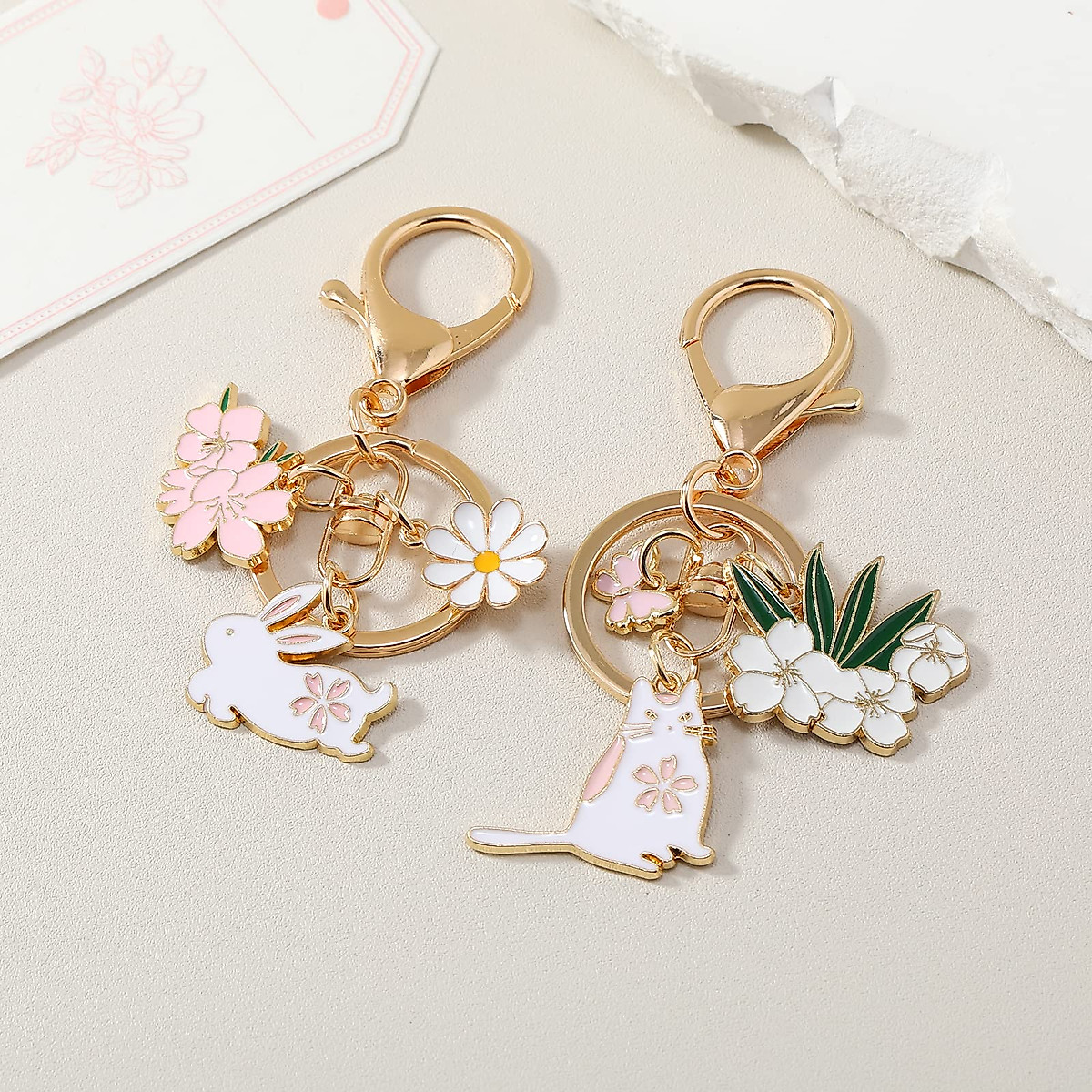 HEYU Cute Keychain for Girls 2PCS Kawaii Aesthetic Accessory Key Chain For Women Cartoon Airpod Backpack Charm Keyring Gifts (Pink Rabbit Cat)