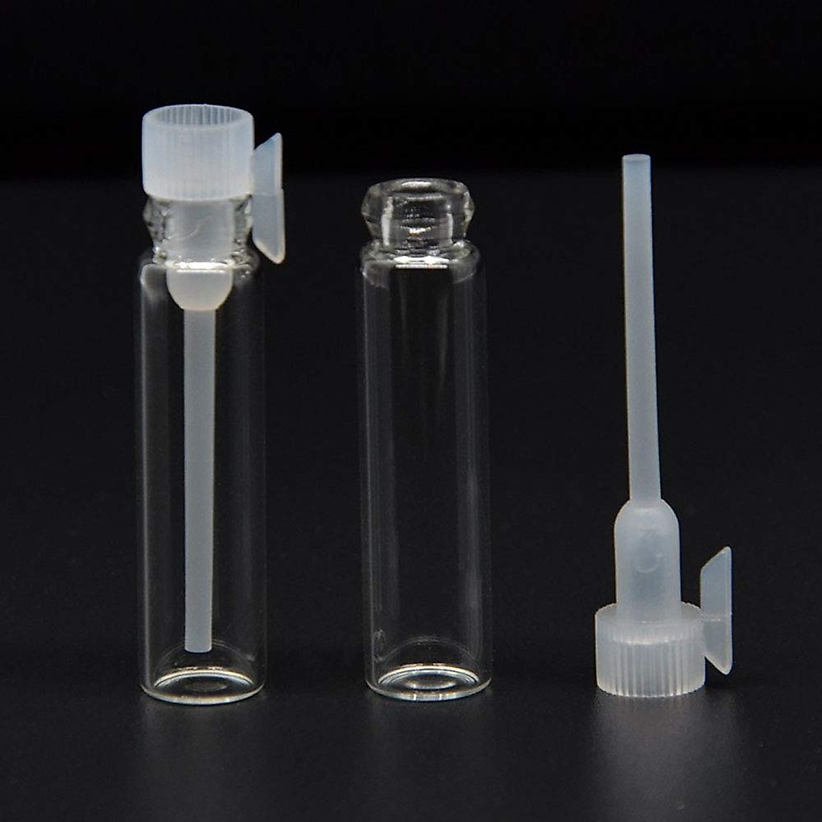 Teensery 100 Pcs Empty Perfume Sample Bottles Mini Glass Refillable Sample Vial Containers with Clear Cap for Aromatherapy, Essential Oil, Fragrance and Liquid (1ml)