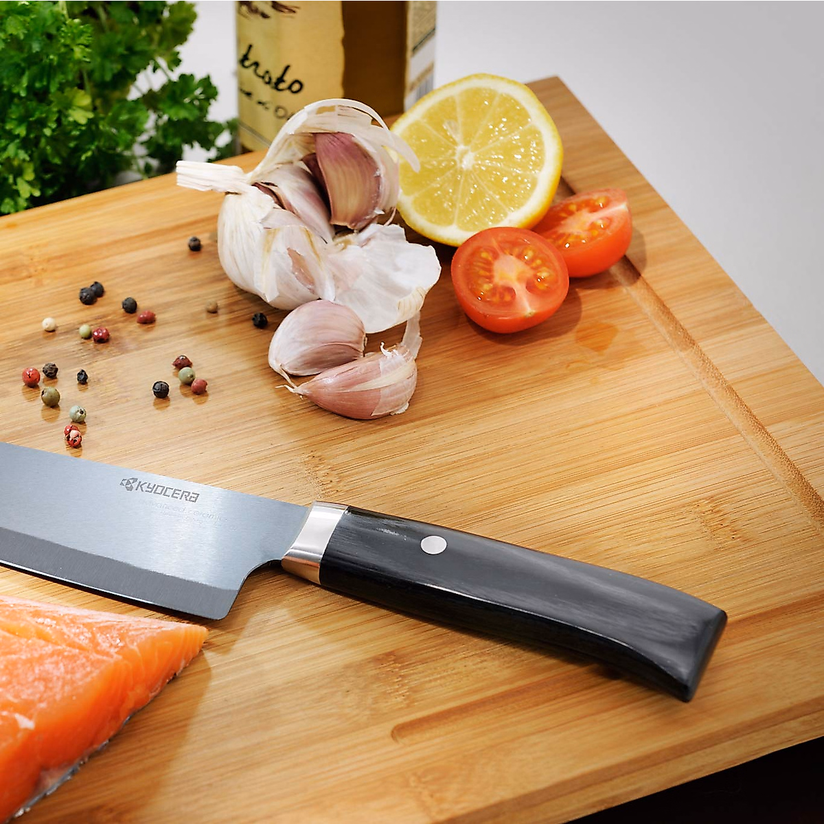 Kyocera Advanced Ceramic LTD Series Chef Knife with Handcrafted Pakka Wood Handle, 7-Inch, Black Blade