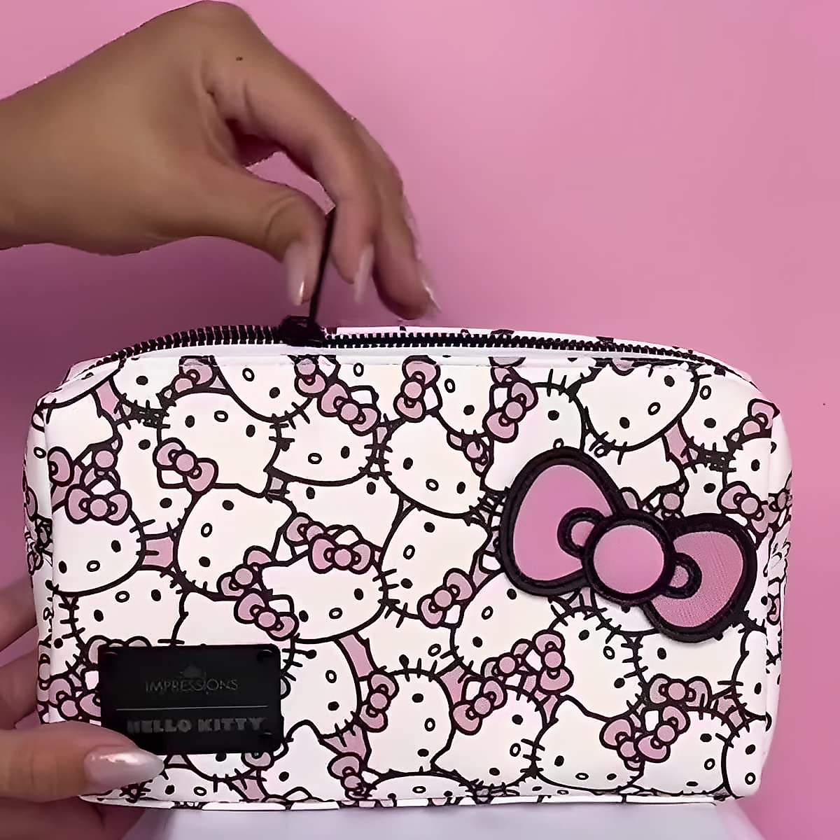 Impressions Vanity Hello Kitty Cosmetic Pouch with Waterproof Faux Leather, Zippered Bag For Travel Size Toiletries, Makeup Bag Organizer With Inside Pocket With Extra Slip Pocket (White/Pink)