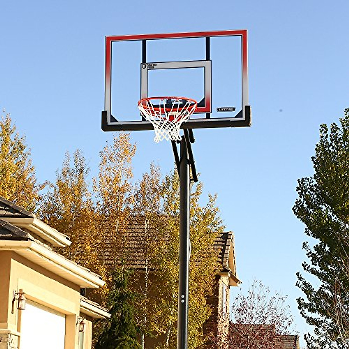 Lifetime In-Ground Basketball Hoop with 50 Inch Steel-Framed Shatterproof Backboard, Heavy Duty Slam-It Rim, 3-Piece Steel Pole, Action Grip Adjustment Mechanism