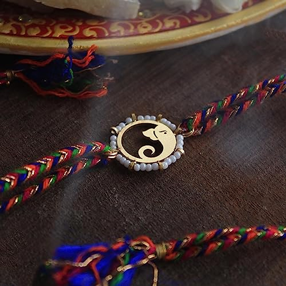 Abhika Creations Golden Beaded Divinity Rakhi for Brother Rakhsha Bandhan Handmade Designer Indian Rakhi
