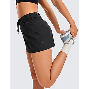 CRZ YOGA Stretch Shorts for Women Work Casual 2.5'' - Athletic Shorts with Pockets for Workout Travel Hiking Golf Black Medium