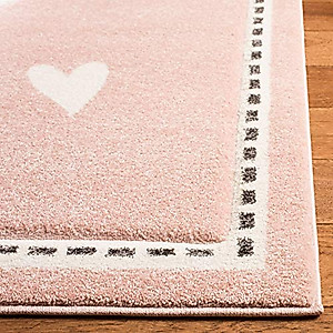 SAFAVIEH Carousel Kids Collection Accent Rug - 3'3" x 5'3", Pink & Ivory, Bunny Design, Non-Shedding & Easy Care, Ideal for High Traffic Areas for Boys & Girls in Playroom, Nursery, Bedroom (CRK166P)