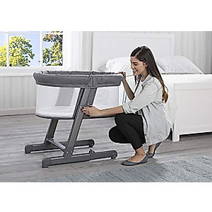 Simmons Kids Oval City Sleeper Bedside Bassinet - Adjustable Height Portable Crib with Wheels & Airflow Mesh, Grey Tweed 31.5x19.7x30 Inch (Pack of 1)