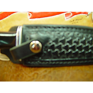 Custom Right-hand Leather knife sheath for the Buck 119 dyed black. Made with Authentic Buffalo Hide Leather and has round basket-weave tooling with strap. Sheath ONLY!!!!