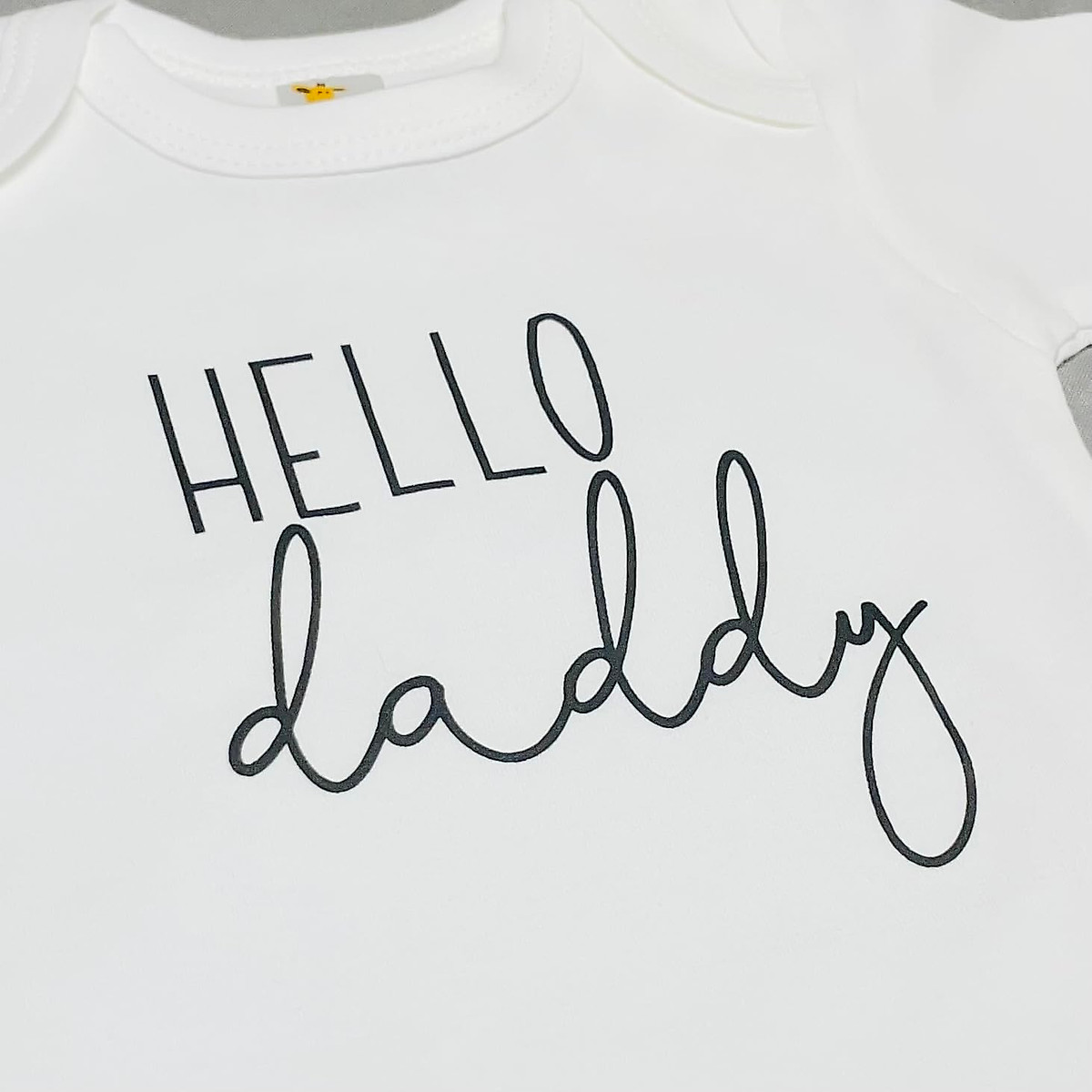 Bump and Beyond Designs Baby-Boys Hello Daddy Surprise Pregnancy Announcement Leotard to New Dad White, 0-3 Months
