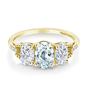 Gem Stone King 10K Yellow Gold Sky Blue Aquamarine White Moissanite and Diamond Accent 3-Stone Women Engagement Ring (1.77 Cttw, Available In Size 5, 6, 7, 8, 9)