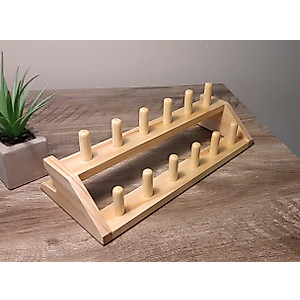 Saxophone mouthpiece wooden stand holder rack for 12 mouthpieces.