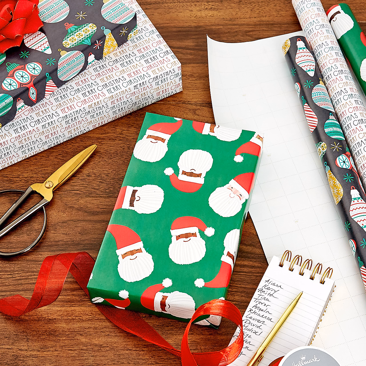 Hallmark Christmas Wrapping Paper for Kids with Cut Lines on Reverse (3 Rolls: 120 Sq. Ft. Ttl.) Multicultural Santa Claus, Ornaments on Black, "Merry Christmas" in Red, Green and Yellow