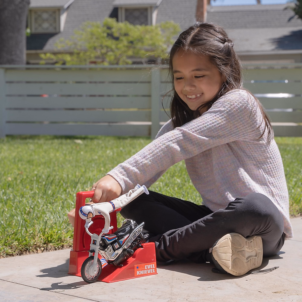 Evel Knievel Stunt Cycle - The Amazing Wind Up and Go Action Toy Launcher for Ultimate Jumps, Crashes, Flips and More - 8 Inch Bike Jumps Anywhere from 3 to 10 Feet - Original 1970's