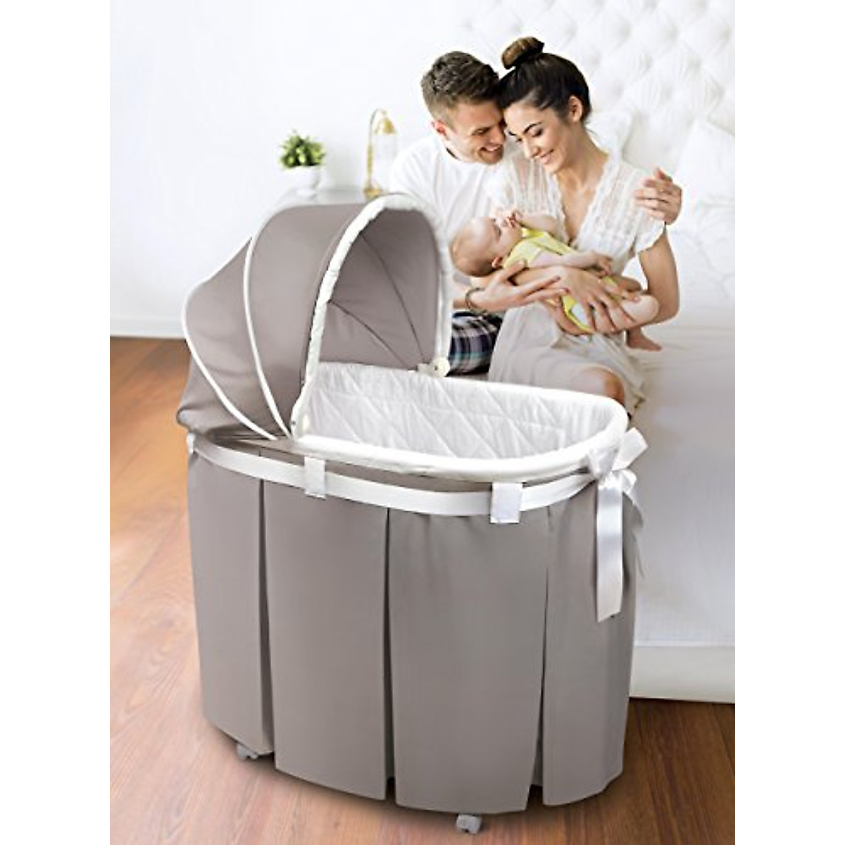 Wishes Oval Rocking Baby Bassinet with Bedding, Storage, and Pad