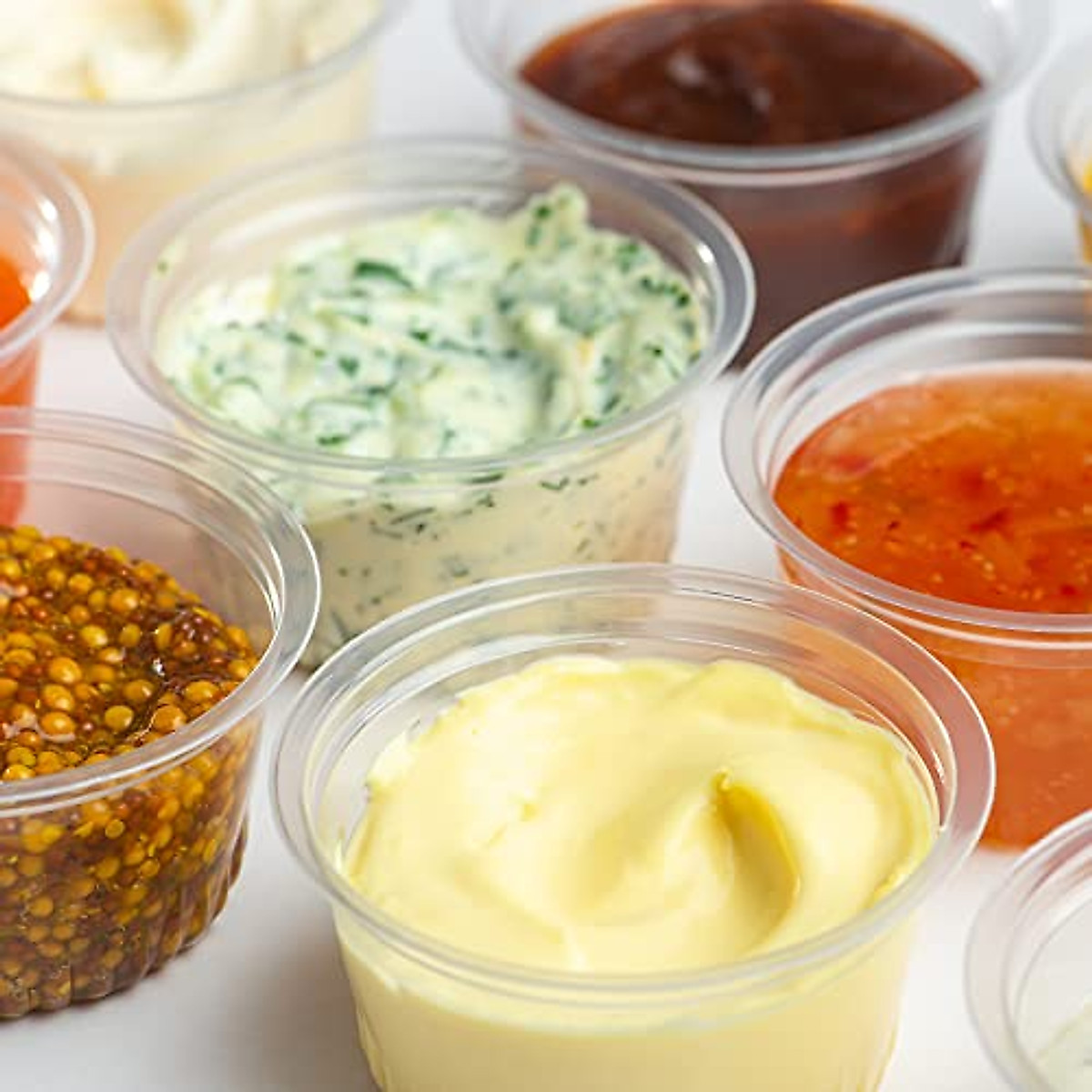 DecorRack 24 pack 2 oz Plastic Portion Cups with Lids, BPA Free Plastic Disposable Containers with Leakproof Lids for Souffle, Jello Shot Cups, Condiments, and Dipping Sauce (24 Pack)