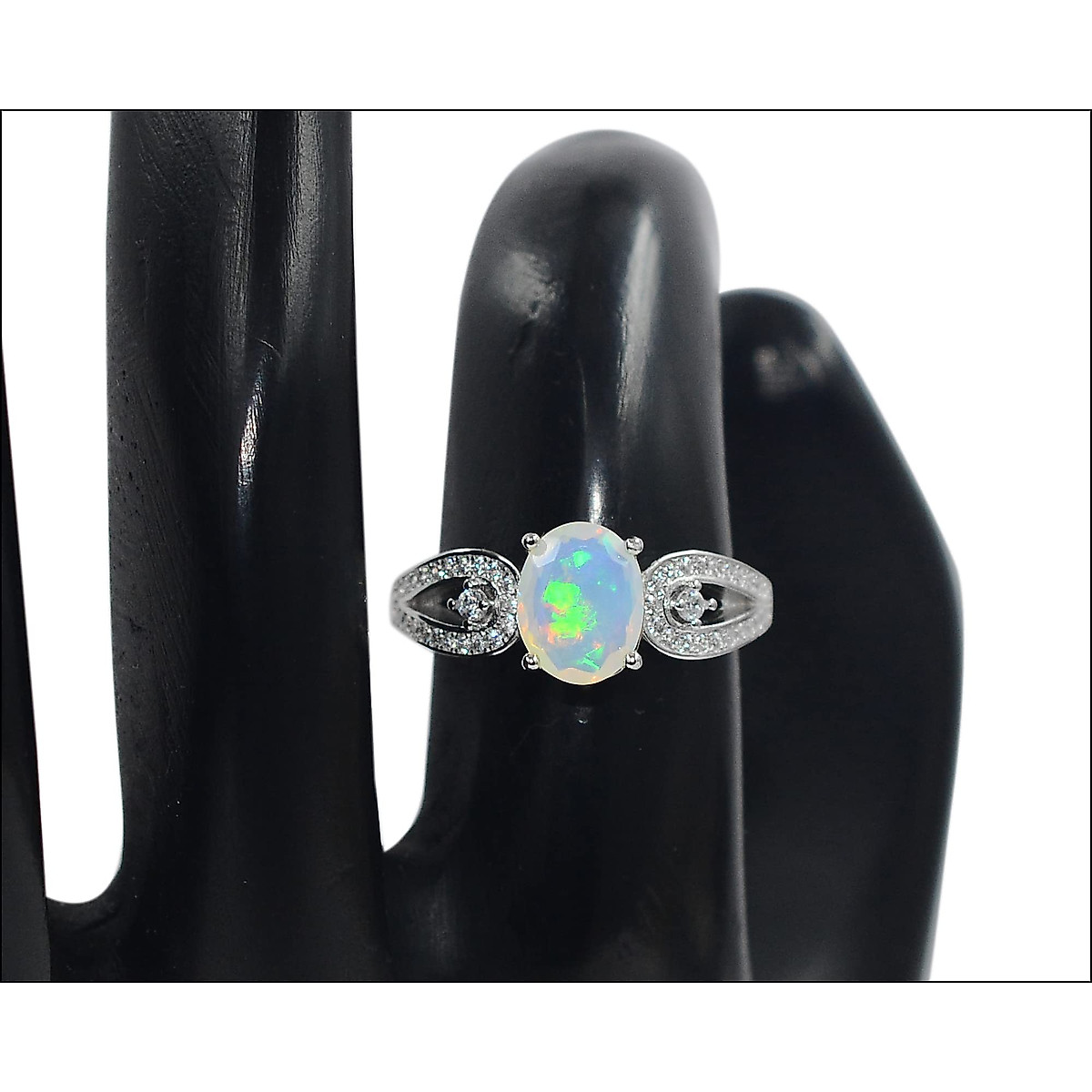 925 Sterling Silver Natural Ethiopian Welo Cut Opal 9X7 MM Oval October Birthstone Solitaire Unisex Proposal Ring For Engagement Gift (Rhodium Plated Silver, 7.5)