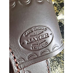 Custom Cross Draw Knife Sheath for Buck 102 Knife. The Sheath Is Made Out of 10 Ounce Water Buffalo Hide Leather the Leather Is Soft Pliable and Very Durable. This Sheath Can Be Worn on the Right or Left Hand Side. It Is Died Dark Brown with Border Toolin
