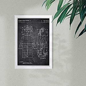 Wynwood Studio Entertainment and Hobbies Framed Wall Art Prints 'Lego Toy Figure 1979 Chalkboard' Home Décor, 13" x 19", Black, White