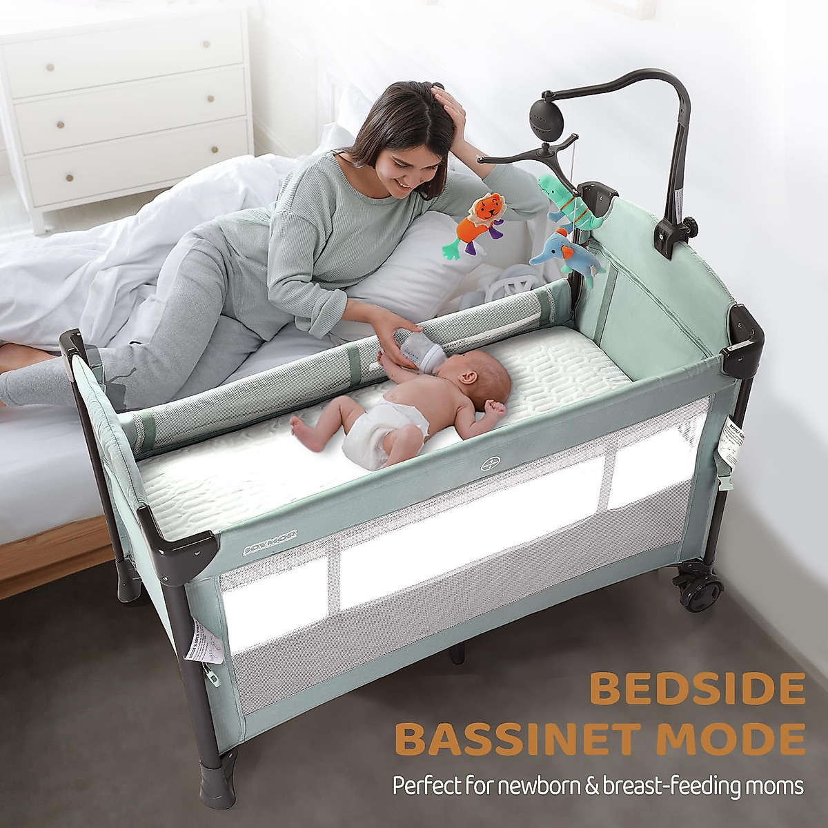 JOYMOR 3 in 1 Baby Bedside Bassinet, Bedside Sleeper with Mattress and Sheet, Convert to Bassinet, Playpen, Foldable Travel Bassinet Bed, with Toy, Wheels, Brake, Carry Bag