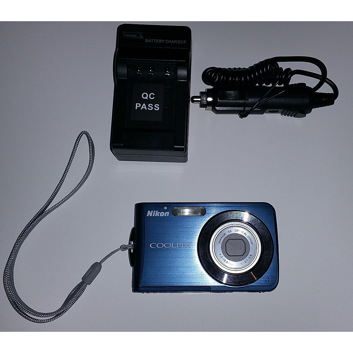 Nikon Coolpix S210 8MP Digital Camera with 3x Optical Zoom (Cool Blue)