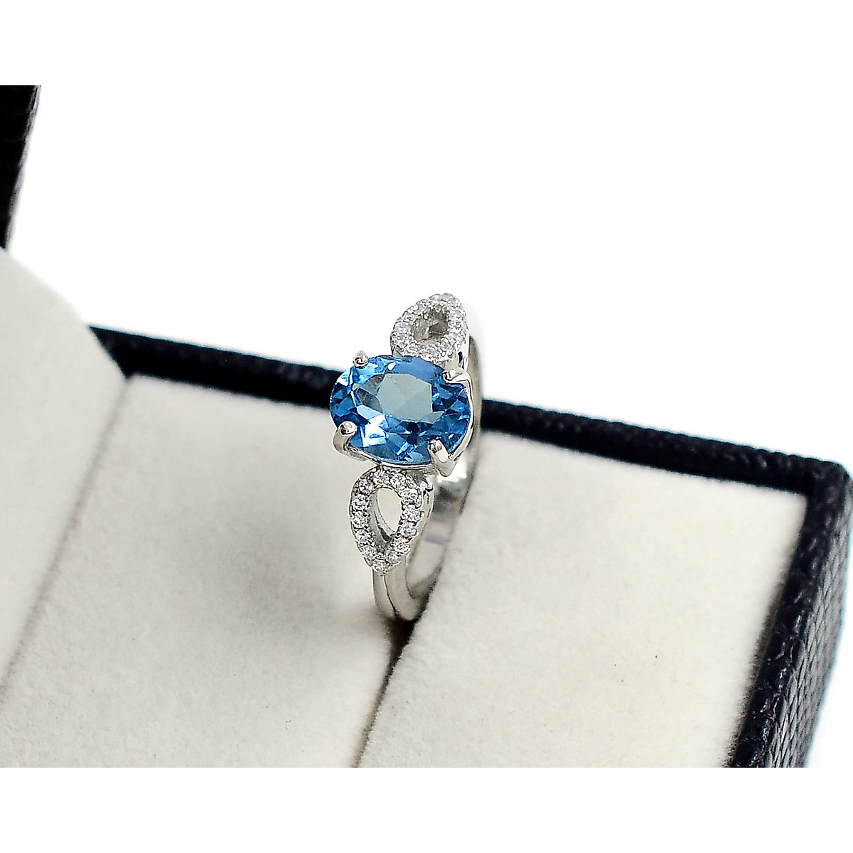 925 Sterling Silver Natural 9X7 MM Oval Cut Swiss Blue Topaz December Birthstone Solitaire Unisex Proposal Engagement Ring Wedding Jewelry Gift For Her (Rhodium Plated Silver, 7.5)