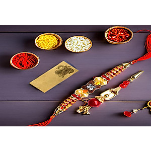 Purpledip Bhai Dooj Rakhi Set For Bhaiya Bhabhi In Shagun Envelop With Auspicious Roli Chawal Tika (rakhi35r)