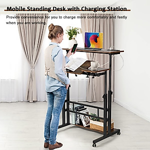 Hadulcet Mobile Standing Desk Adjustable Height, Rolling Desk Stand Up Desk, Mobile Laptop Desk, Rolling Computer Desk with Charging Station, Portable Desk with Wheels, Rustic Brown