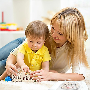 Yalikop 14 Pcs Wooden Baby Milestone Discs Cards Double Sided Baby Monthly Milestone Blocks Picture Props for Newborn Gift Pregnancy Birth Announcement Sign Month Baby Milestone Card with Storage Bag