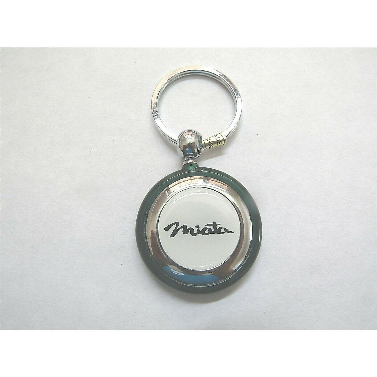 1990's 2000's MIATA VINTAGE LOGO ROUND PLASTIC KEYCHAIN - GREEN