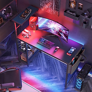 Bestier Gaming Desk with LED Lights, 44 Inch PC Gamer Desk for Small Spaces, Computer Desk with Reversible Storage Shelves & Side Storage Bag (Black Grained)