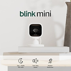 Blink Mini - Compact indoor plug-in smart security camera, 1080p HD video, night vision, motion detection, two-way audio, easy set up, Works with Alexa – 3 cameras (White)