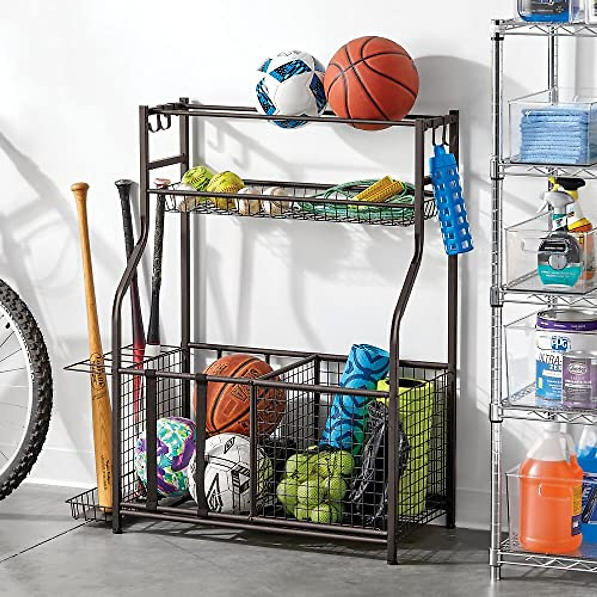 mDesign Metal Heavy Duty Garage Storage System Rack with Top Shelf, Multi-Purpose Sporting Goods Storage with Multiple Compartments, Baskets and Hooks - Holds Equipment, Balls, Bats - Bronze
