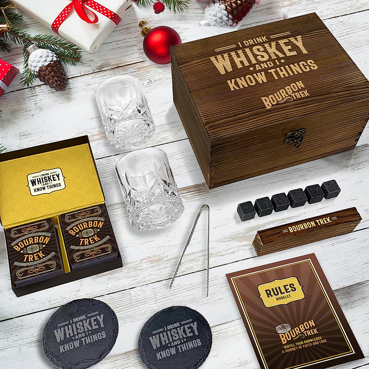 Boxed Set of Whiskey Gifts for Men - Includes Popular Whiskey Trivia, 2 Bourbon Glasses, 6 Stones, 2 Slate Coasters, 1 Wooden Freezer Tray & Stainless Steel Tongs - All in 1 Premium Giftable Box