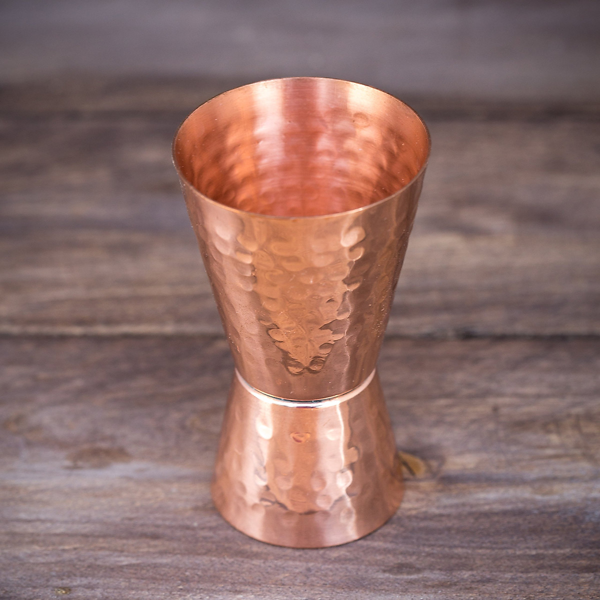 Copper jigger lacquered for the shine and to prevent tarnish. - Double 1oz/2oz copper measuring jigger for cocktail mixing. - Solid hammered copper 22G copper. - Copper shot glass for Moscow mule.
