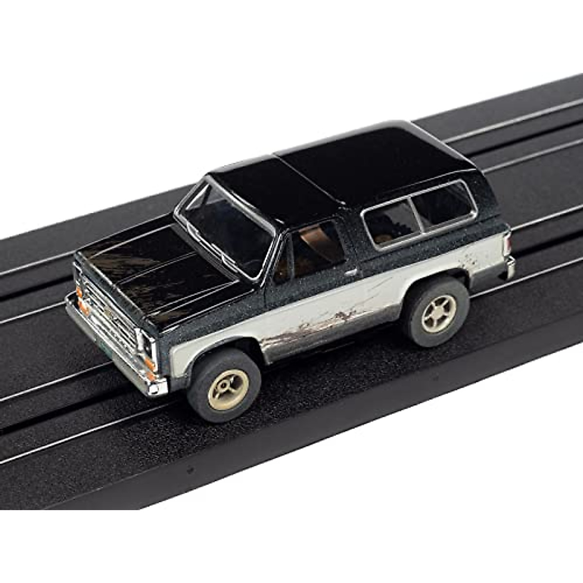 Auto World Xtraction 1977 Chevrolet Blazer Black/White HO Scale Slot Car