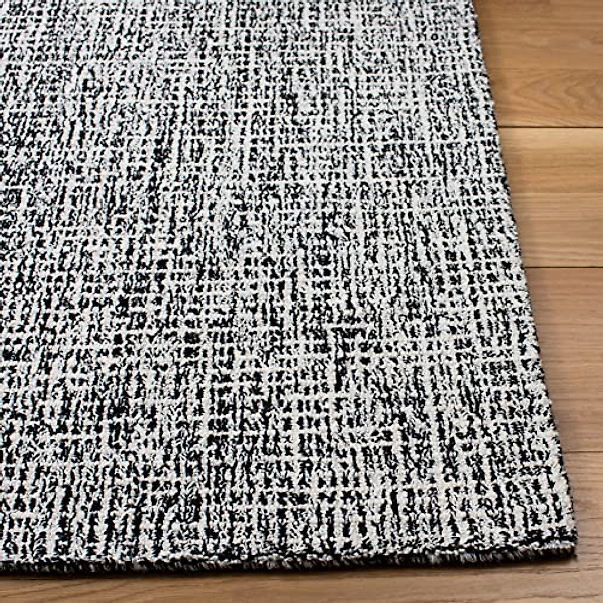 SAFAVIEH Abstract Collection Area Rug - 8' x 10', Black & Ivory, Handmade Wool, Ideal for High Traffic Areas in Living Room, Bedroom (ABT468Z)