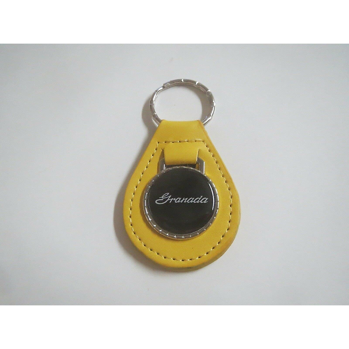 1975 1976 1977 1978 1979 1980 1981 1982 GRANADA SCRIPT LOGO LEATHER KEYCHAIN - YELLOW