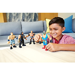 ​​WWE Basic Action Figures, Posable 5.5-inch Collectible for Ages 6 Years Old & Up