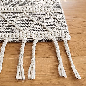 SAFAVIEH Natura Collection Accent Rug - 4' x 6', Ivory & Black, Handmade Moroccan Boho Braided Tassel Wool, Ideal for High Traffic Areas in Entryway, Living Room, Bedroom (NAT339A)