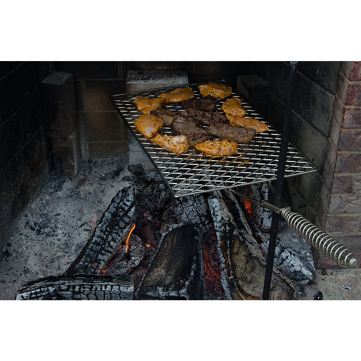 Heavy Duty Large Campfire Grill, Fully Adjustable Swiveling BBQ with long handle, Lifetime Durability, Perfect for Fire pits and rings. Easily portable for camping. Made in USA (15x21)