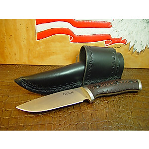 Custom cross draw knife sheath for the buck Selkirk knife. The sheath is made out of water buffalo hide leather Black.